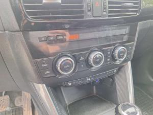 Grey Mazda CX-5 2013 in Panevezys, with an engine capacity of 2.19 L and mileage of 197 thousand km for 3900 €, photo 14 on AUTOMOTO.COM.LV