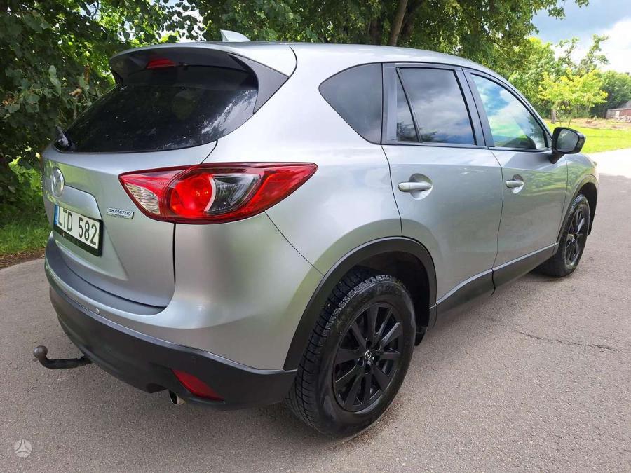 Grey Mazda CX-5 2013 in Kelme, with an engine capacity of 2.20 L and mileage of 249 thousand km for 5300 €, photo 3 on AUTOMOTO.COM.LV