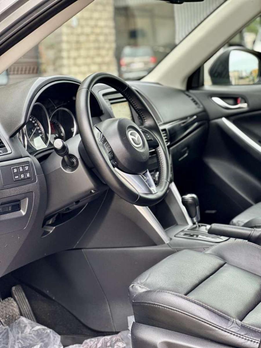 Grey Mazda CX-5 2013 in Kretinga, with an engine capacity of 2.20 L and mileage of 237 thousand km for 7500 €, photo 13 on AUTOMOTO.COM.LV