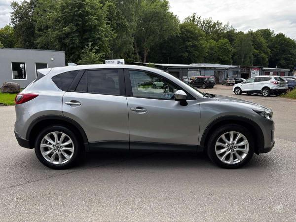 Grey Mazda CX-5 2013 in Panevezys, with an engine capacity of 2.19 L and mileage of 134 thousand km for 6999 €, photo 4 on AUTOMOTO.COM.LV