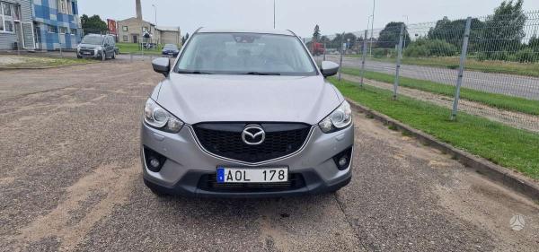 Grey Mazda CX-5 2013 in Telschi, with an engine capacity of 2.19 L and mileage of 296 thousand km for 6250 €, photo 3 on AUTOMOTO.COM.LV