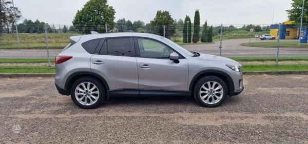 Grey Mazda CX-5 2013 in Telschi, with an engine capacity of 2.19 L and mileage of 296 thousand km for 6250 €, photo 4 on AUTOMOTO.COM.LV