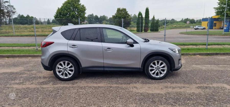 Pelēks Mazda CX-5 2013 Telšiai, ar dzinēja tilpumu 2.19 L un nobraukumu 296 tūkst. km par 6250 €, foto 5 vietnē AUTOMOTO.COM.LV