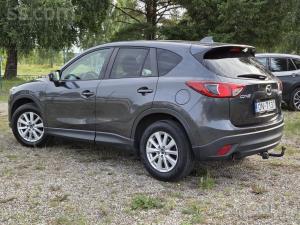 Pelēks Mazda CX-5 2013 Kuldīga, ar dzinēja tilpumu 2.00 L un nobraukumu 255 tūkst. km par 8400 €, foto 6 vietnē AUTOMOTO.COM.LV