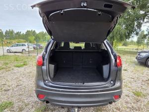 Pelēks Mazda CX-5 2013 Kuldīga, ar dzinēja tilpumu 2.00 L un nobraukumu 255 tūkst. km par 8400 €, foto 18 vietnē AUTOMOTO.COM.LV