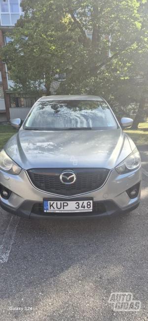 Grey Mazda CX-5 2013 in Alytus, with an engine capacity of 2.20 L and mileage of 265 thousand km for 6300 €, photo 4 on AUTOMOTO.COM.LV