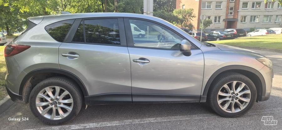 Grey Mazda CX-5 2013 in Alytus, with an engine capacity of 2.20 L and mileage of 265 thousand km for 6300 €, photo 5 on AUTOMOTO.COM.LV