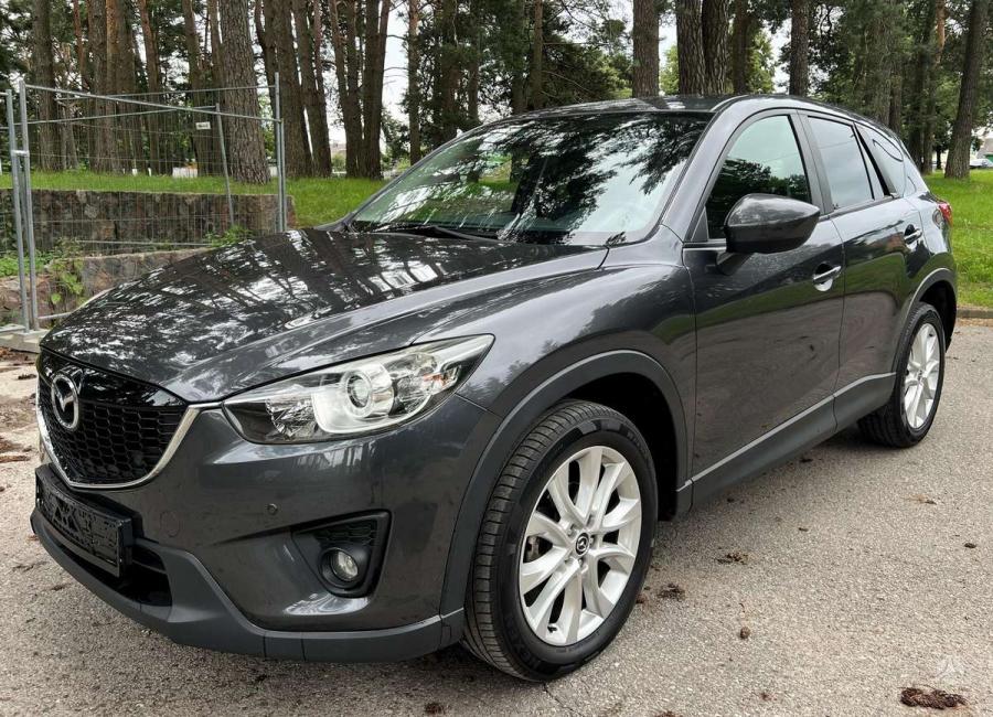 Grey Mazda CX-5 2013 in Vilnius, with an engine capacity of 2.20 L and mileage of 185 thousand km for 7400 €, photo 1 on AUTOMOTO.COM.LV