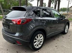 Grey Mazda CX-5 2013 in Vilnius, with an engine capacity of 2.20 L and mileage of 185 thousand km for 7400 €, photo 4 on AUTOMOTO.COM.LV
