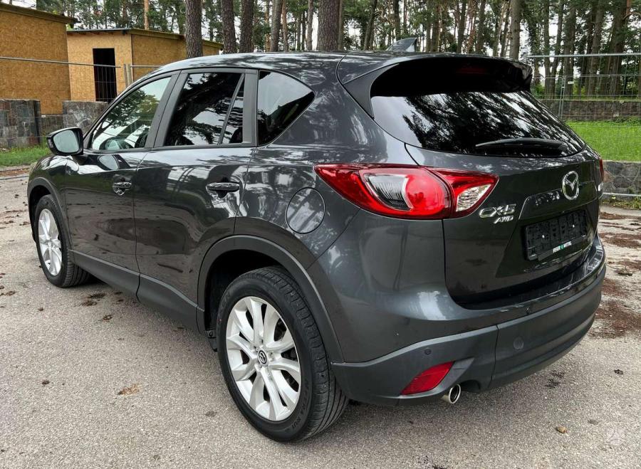 Grey Mazda CX-5 2013 in Vilnius, with an engine capacity of 2.20 L and mileage of 185 thousand km for 7400 €, photo 5 on AUTOMOTO.COM.LV