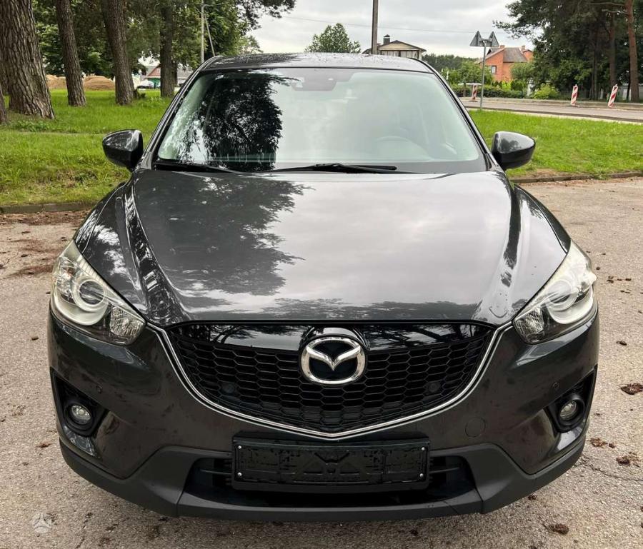 Grey Mazda CX-5 2013 in Vilnius, with an engine capacity of 2.20 L and mileage of 185 thousand km for 7400 €, photo 6 on AUTOMOTO.COM.LV