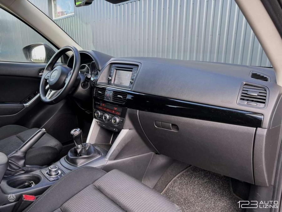 Pelēks Mazda CX-5 2013 Tauragė, ar dzinēja tilpumu 2.20 L un nobraukumu 172 tūkst. km par 6200 €, foto 13 vietnē AUTOMOTO.COM.LV