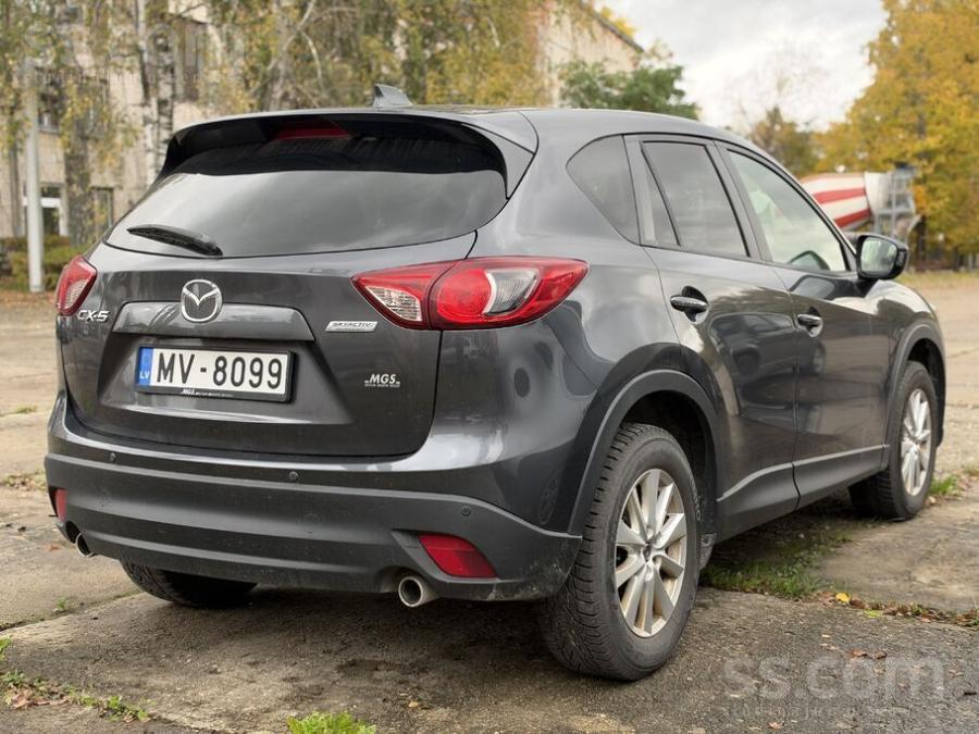 Grey Mazda CX-5 2013 in Valmiera, with an engine capacity of 2.20 L and mileage of 230 thousand km for 2750 €, photo 3 on AUTOMOTO.COM.LV