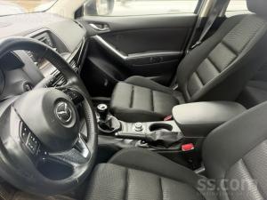 Grey Mazda CX-5 2013 in Valmiera, with an engine capacity of 2.20 L and mileage of 230 thousand km for 2750 €, photo 6 on AUTOMOTO.COM.LV