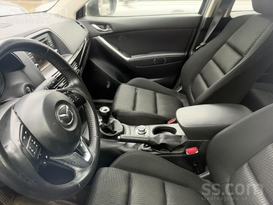 Grey Mazda CX-5 2013 in Valmiera, with an engine capacity of 2.20 L and mileage of 230 thousand km for 2750 €, photo 6 on AUTOMOTO.COM.LV