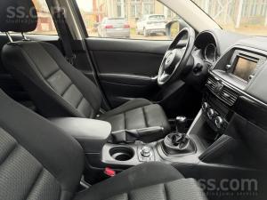 Grey Mazda CX-5 2013 in Valmiera, with an engine capacity of 2.20 L and mileage of 230 thousand km for 2750 €, photo 7 on AUTOMOTO.COM.LV