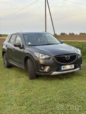 Pelēks Mazda CX-5 2013 Dobele, ar dzinēja tilpumu 2.20 L un nobraukumu 147 tūkst. km par 8200 €, foto  vietnē AUTOMOTO.COM.LV