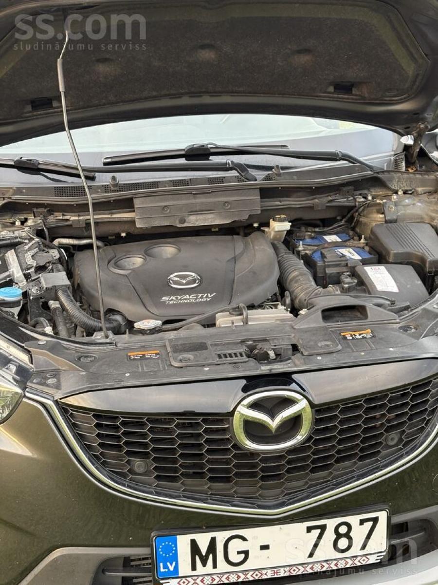 Pelēks Mazda CX-5 2013 Dobele, ar dzinēja tilpumu 2.20 L un nobraukumu 147 tūkst. km par 8200 €, foto 13 vietnē AUTOMOTO.COM.LV