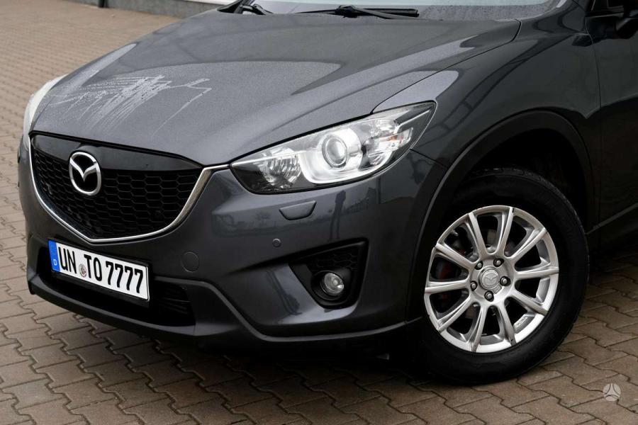 Grey Mazda CX-5 2014 in Kretinga, with an engine capacity of 2.19 L and mileage of 231 thousand km for 8599 €, photo 4 on AUTOMOTO.COM.LV