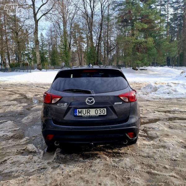 Pelēks Mazda CX-5 2014 Mažeikiai, ar dzinēja tilpumu 2.20 L un nobraukumu 207 tūkst. km par 7200 €, foto 4 vietnē AUTOMOTO.COM.LV