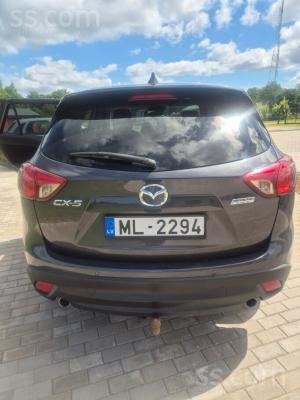 Grey Mazda CX-5 2014 in Riga, with an engine capacity of 2.20 L and mileage of 321 thousand km for 7200 €, photo 4 on AUTOMOTO.COM.LV