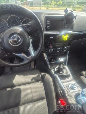 Grey Mazda CX-5 2014 in Riga, with an engine capacity of 2.20 L and mileage of 321 thousand km for 7200 €, photo 7 on AUTOMOTO.COM.LV