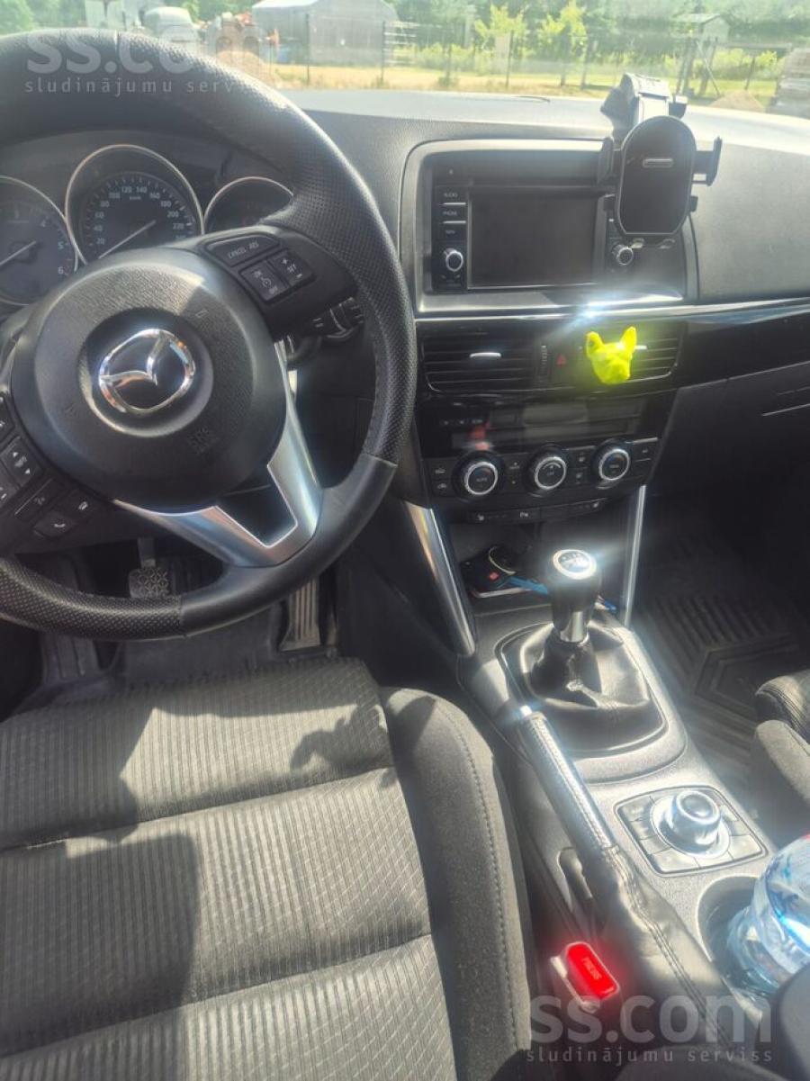 Grey Mazda CX-5 2014 in Riga, with an engine capacity of 2.20 L and mileage of 321 thousand km for 7200 €, photo 7 on AUTOMOTO.COM.LV