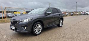 Grey Mazda CX-5 2014 in Vilnius, with an engine capacity of 2.19 L and mileage of 230 thousand km for 6400 €, photo 3 on AUTOMOTO.COM.LV