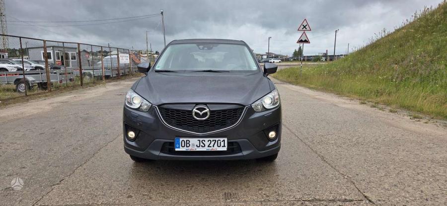 Grey Mazda CX-5 2014 in Vilnius, with an engine capacity of 2.19 L and mileage of 230 thousand km for 6400 €, photo 4 on AUTOMOTO.COM.LV
