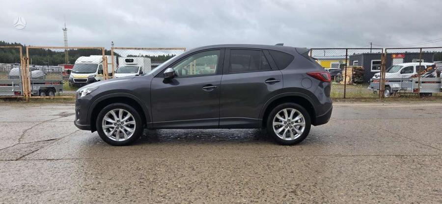 Grey Mazda CX-5 2014 in Vilnius, with an engine capacity of 2.19 L and mileage of 230 thousand km for 6400 €, photo 5 on AUTOMOTO.COM.LV
