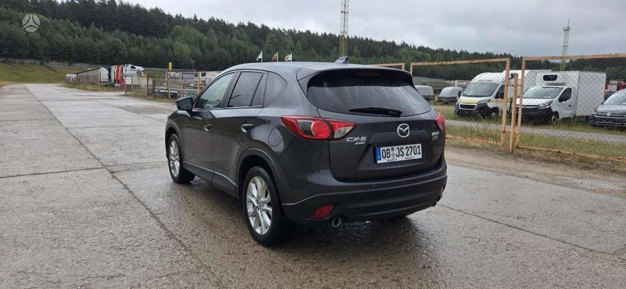 Grey Mazda CX-5 2014 in Vilnius, with an engine capacity of 2.19 L and mileage of 230 thousand km for 6400 €, photo 7 on AUTOMOTO.COM.LV