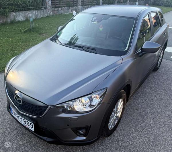 Grey Mazda CX-5 2014 in Vilnius, with an engine capacity of 2.19 L and mileage of 235 thousand km for 5500 €, photo 2 on AUTOMOTO.COM.LV
