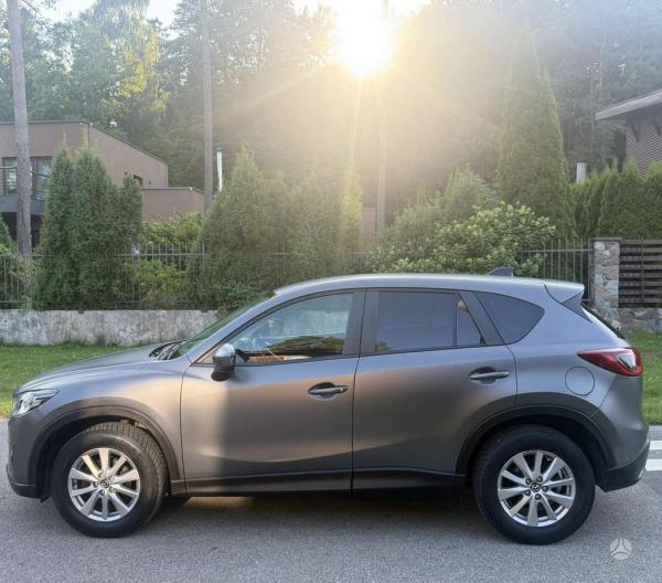 Grey Mazda CX-5 2014 in Vilnius, with an engine capacity of 2.19 L and mileage of 235 thousand km for 5500 €, photo 7 on AUTOMOTO.COM.LV