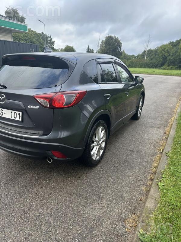Pelēks Mazda CX-5 2014 Rīga, ar dzinēja tilpumu 2.00 L un nobraukumu 146 tūkst. km par 9000 €, foto 2 vietnē AUTOMOTO.COM.LV