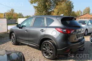 Pelēks Mazda CX-5 2014 Daugavpils, ar dzinēja tilpumu 2.20 L un nobraukumu 256 tūkst. km par 7490 €, foto 5 vietnē AUTOMOTO.COM.LV