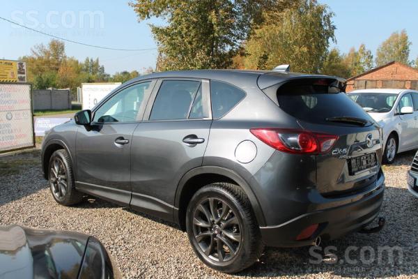 Pelēks Mazda CX-5 2014 Daugavpils, ar dzinēja tilpumu 2.20 L un nobraukumu 256 tūkst. km par 7490 €, foto 5 vietnē AUTOMOTO.COM.LV