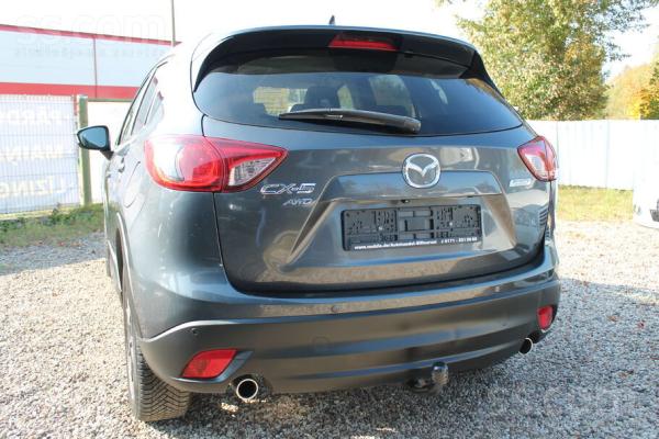Pelēks Mazda CX-5 2014 Daugavpils, ar dzinēja tilpumu 2.20 L un nobraukumu 256 tūkst. km par 7490 €, foto 6 vietnē AUTOMOTO.COM.LV