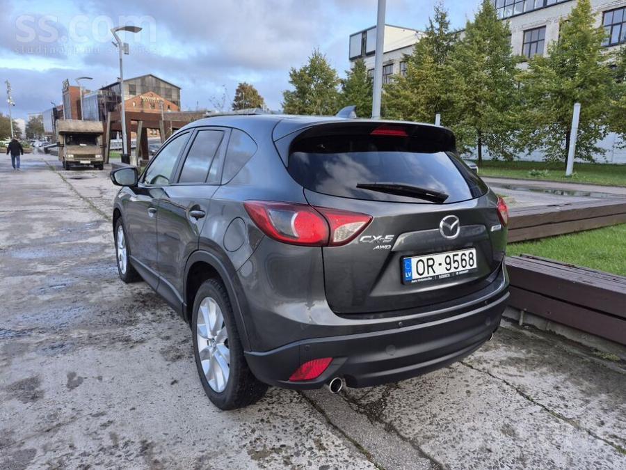 Pelēks Mazda CX-5 2014 Liepāja, ar dzinēja tilpumu 2.20 L un nobraukumu 247 tūkst. km par 5700 €, foto 4 vietnē AUTOMOTO.COM.LV