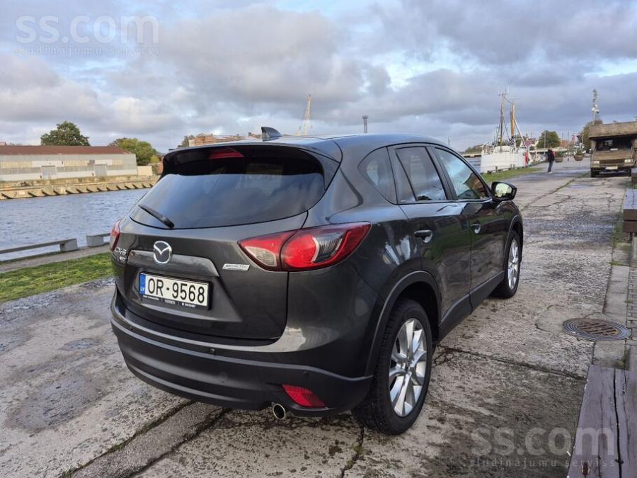 Pelēks Mazda CX-5 2014 Liepāja, ar dzinēja tilpumu 2.20 L un nobraukumu 247 tūkst. km par 5700 €, foto 5 vietnē AUTOMOTO.COM.LV