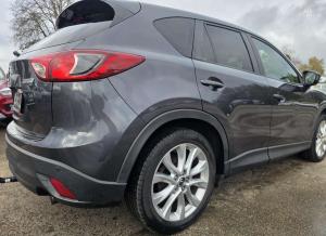 Grey Mazda CX-5 2014 in Marijampole, with an engine capacity of 2.19 L and mileage of 264 thousand km for 5200 €, photo 5 on AUTOMOTO.COM.LV