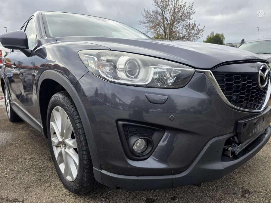 Grey Mazda CX-5 2014 in Marijampole, with an engine capacity of 2.19 L and mileage of 264 thousand km for 5200 €, photo 7 on AUTOMOTO.COM.LV