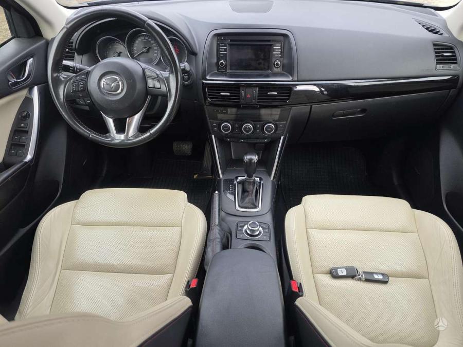 Grey Mazda CX-5 2014 in Marijampole, with an engine capacity of 2.19 L and mileage of 264 thousand km for 5200 €, photo 12 on AUTOMOTO.COM.LV