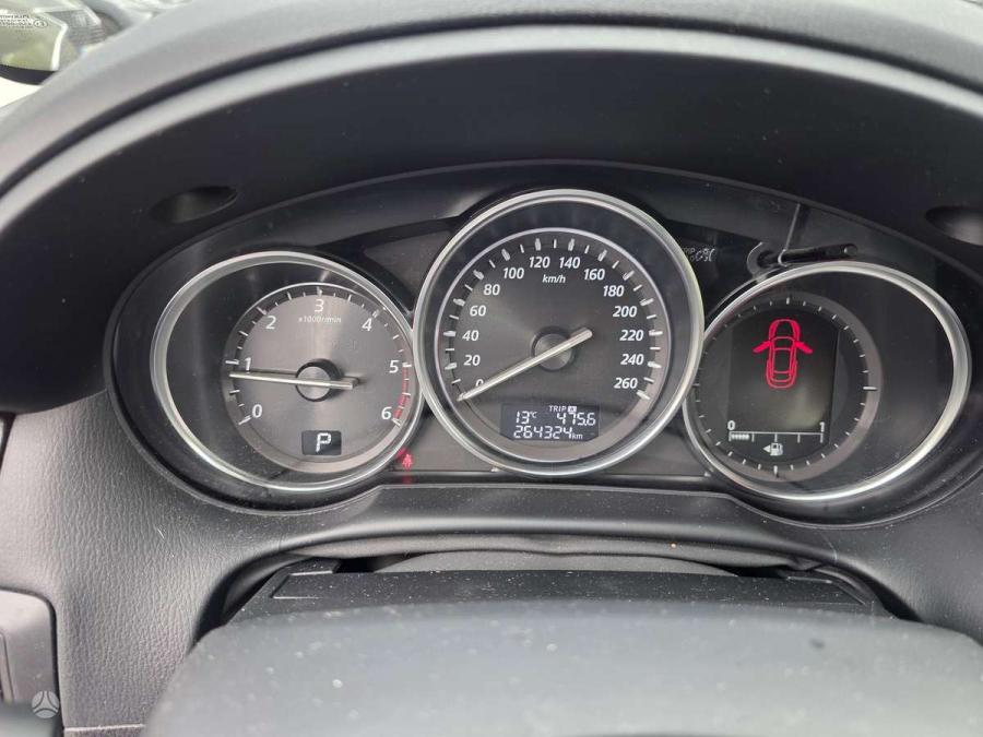 Grey Mazda CX-5 2014 in Marijampole, with an engine capacity of 2.19 L and mileage of 264 thousand km for 5200 €, photo 16 on AUTOMOTO.COM.LV