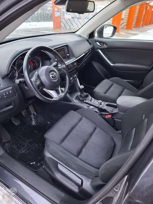 Grey Mazda CX-5 2015 in Vilnius, with an engine capacity of 2.19 L and mileage of 221 thousand km for 7300 €, photo 9 on AUTOMOTO.COM.LV