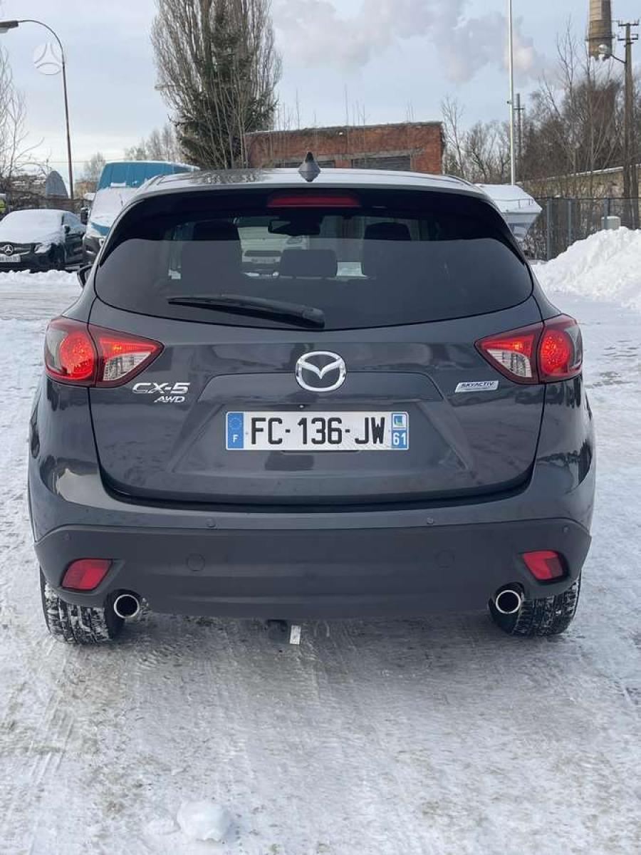Pelēks Mazda CX-5 2015 Tauragė, ar dzinēja tilpumu 2.19 L un nobraukumu 196 tūkst. km par 7990 €, foto 6 vietnē AUTOMOTO.COM.LV