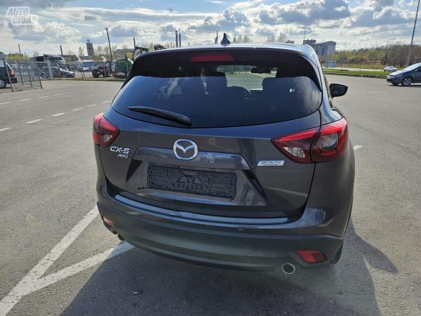 Pelēks Mazda CX-5 2015 Panevēža, ar dzinēja tilpumu 2.20 L un nobraukumu 210 tūkst. km par 6800 €, foto 6 vietnē AUTOMOTO.COM.LV