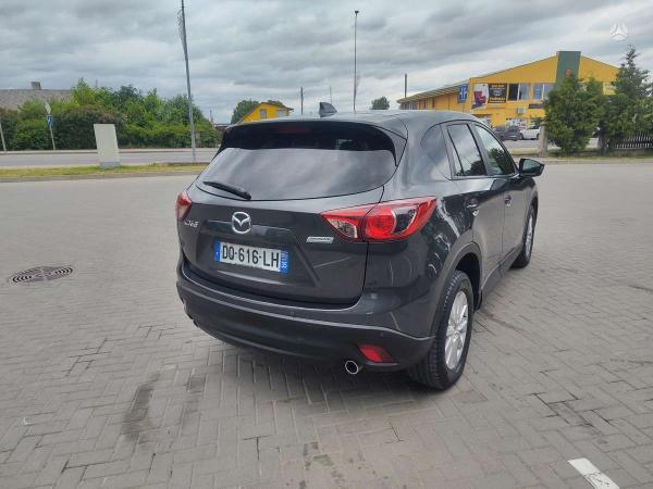 Pelēks Mazda CX-5 2015 Tauragė, ar dzinēja tilpumu 2.19 L un nobraukumu 209 tūkst. km par 6200 €, foto 4 vietnē AUTOMOTO.COM.LV