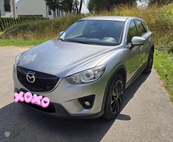 Grey Mazda CX-5 2015 in Vilnius, with an engine capacity of 2.19 L and mileage of 324 thousand km for 7300 €, photo 1 on AUTOMOTO.COM.LV