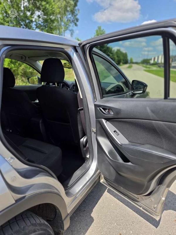 Grey Mazda CX-5 2015 in Vilnius, with an engine capacity of 2.19 L and mileage of 324 thousand km for 7300 €, photo 9 on AUTOMOTO.COM.LV