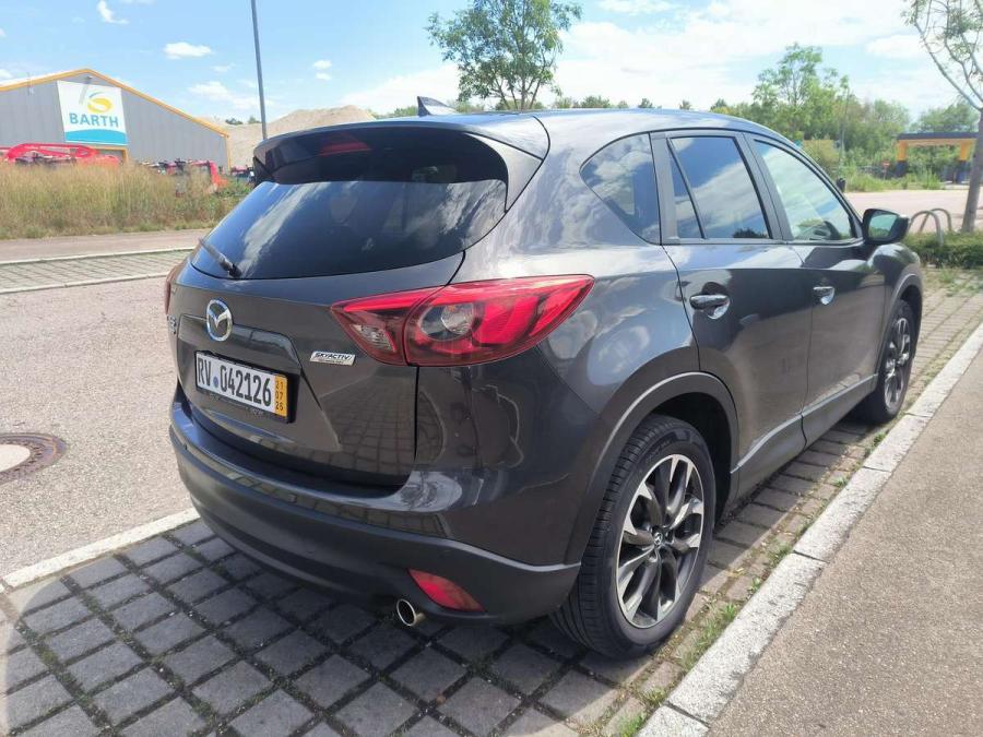 Pelēks Mazda CX-5 2015 Tauragė, ar dzinēja tilpumu 2.19 L un nobraukumu 199 tūkst. km par 6900 €, foto 5 vietnē AUTOMOTO.COM.LV